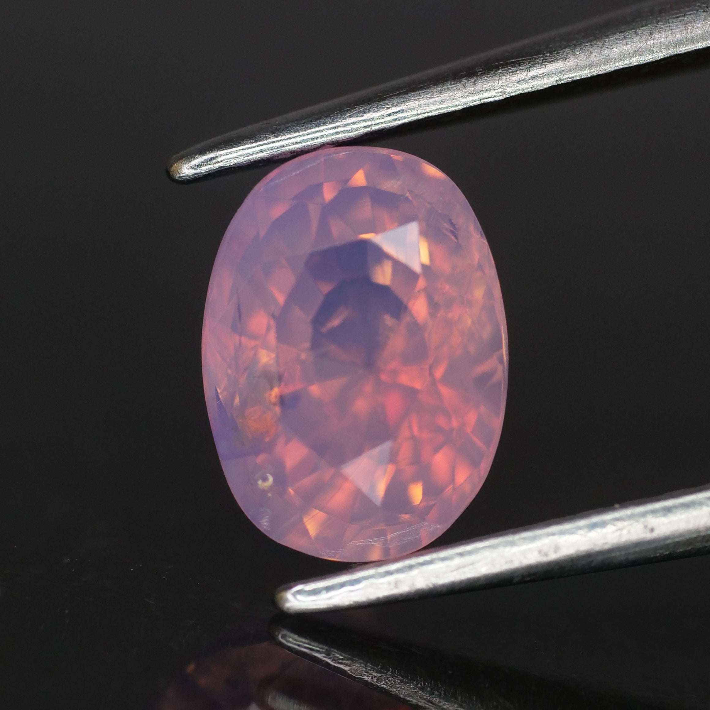 Opalescent sapphire | natural, purplish pink color, oval-cut, 7.5x5.5mm ...